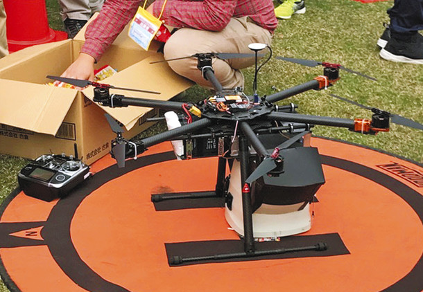 Drone carrying candy crashes into crowd, injuring six in Japan