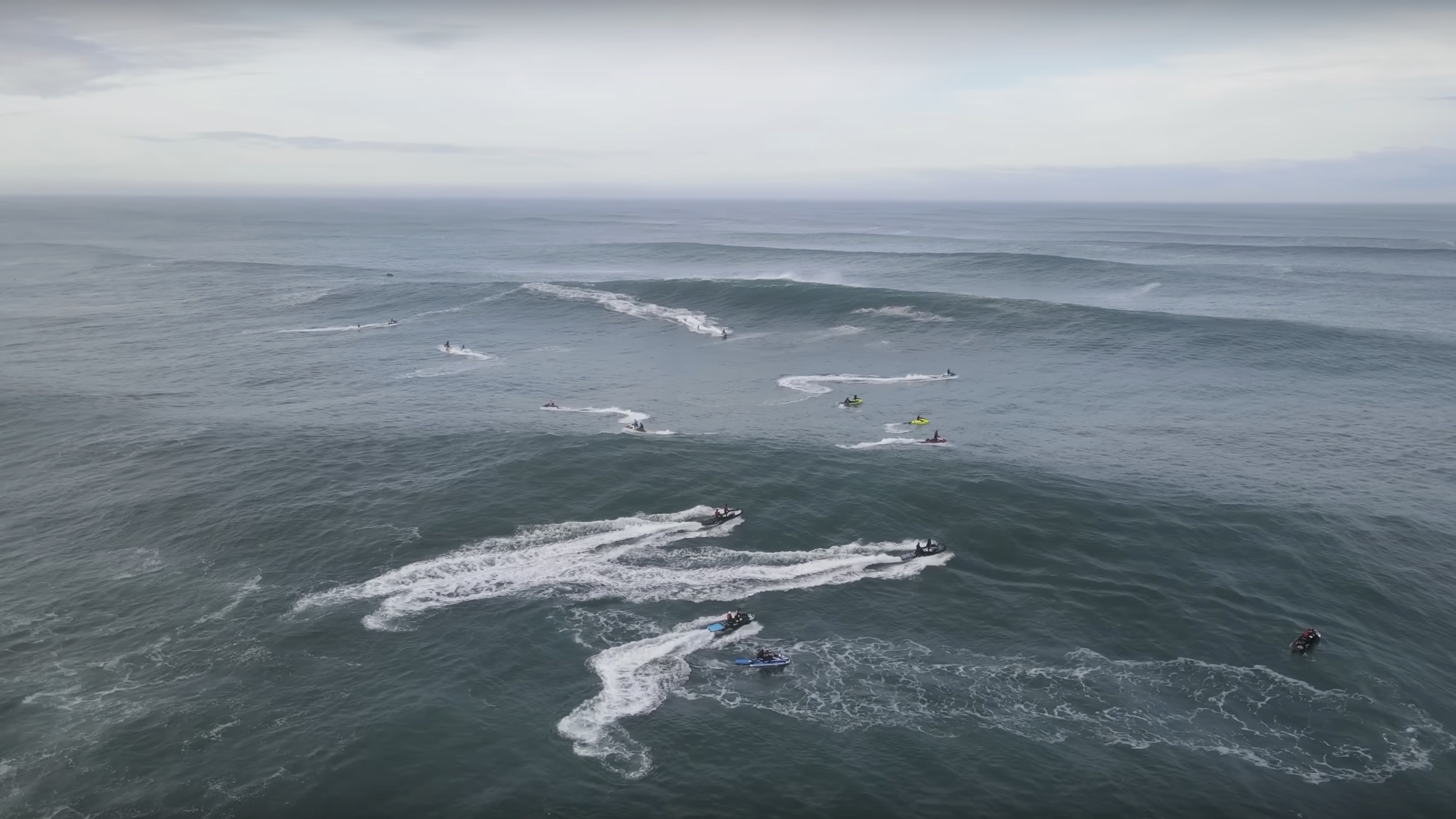 Drone video captures surfers braving liquid mountains at Nazaré
